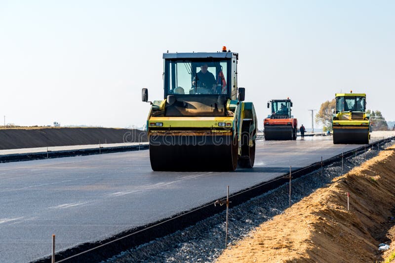 New road construction editorial photo. Image of paver - 62013231