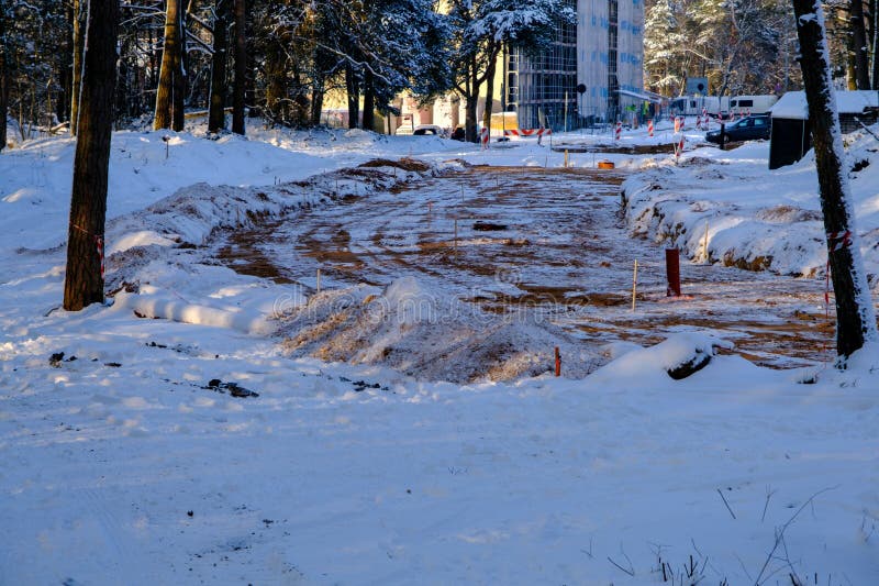New Road Construction Site in the Forest in Winter with Snow and Mud ...