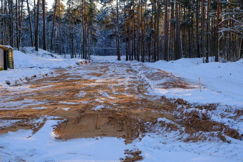New Road Construction Site in the Forest in Winter with Snow and Mud ...