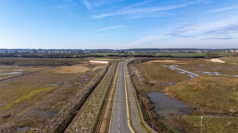 New Road Crossing Rural Landscape Under Development Stock Image - Image ...