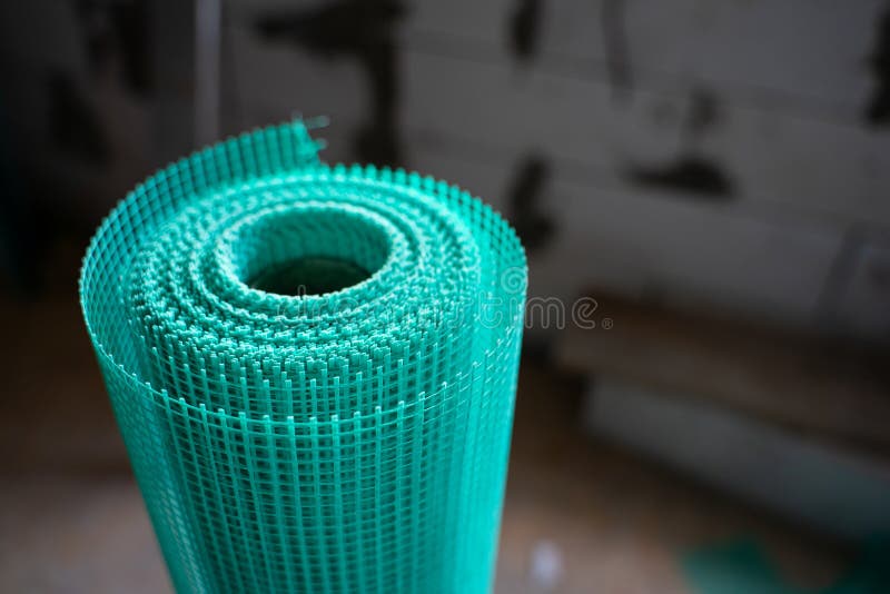 New Roll of Green Plaster Mesh Close-up. Building Materials for Wall ...