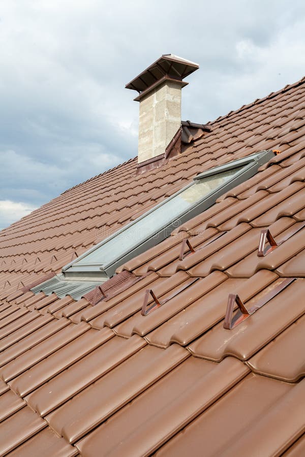 New Roof with Skylight, Natural Red Tile and Chimney Stock Image ...