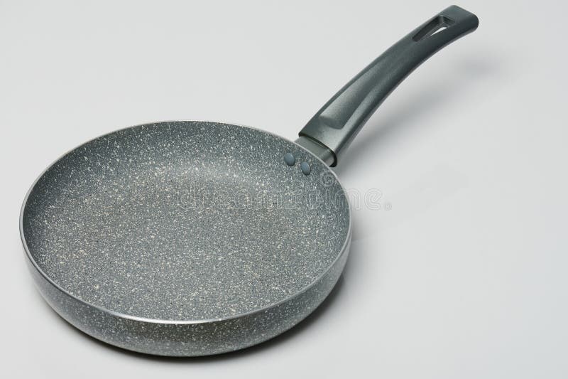 New round grey pan stock photo. Image of cutout, breakfast - 217429688