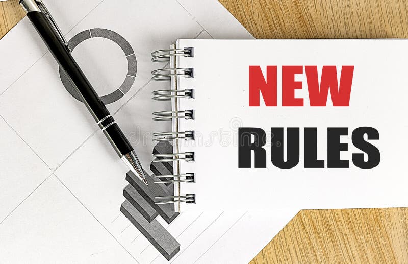 NEW RULES Text on Notebook with Chart on Wooden Background Stock Photo ...