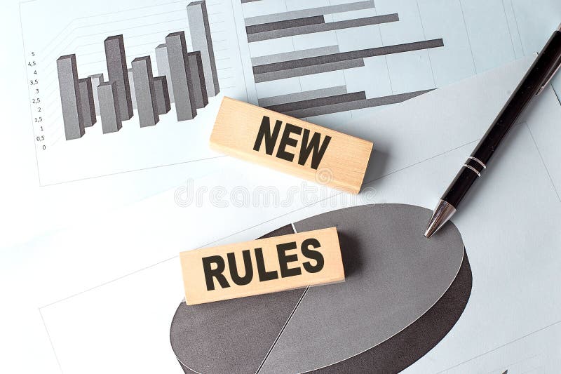 NEW RULES Wooden Block on Chart Background Stock Image - Image of ...