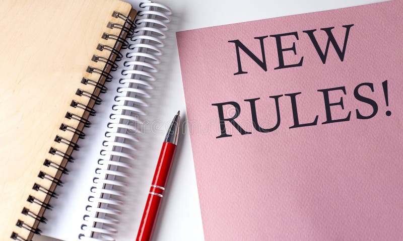 NEW RULES Word on the Pink Paper with Office Tools on White Background ...