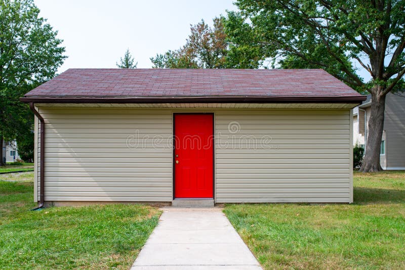 New shed with red doors stock image. Image of storehouse - 196359757