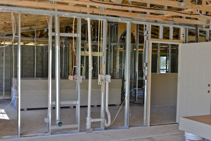 New Single Family Home Under Construction Stock Photo - Image of wooden ...