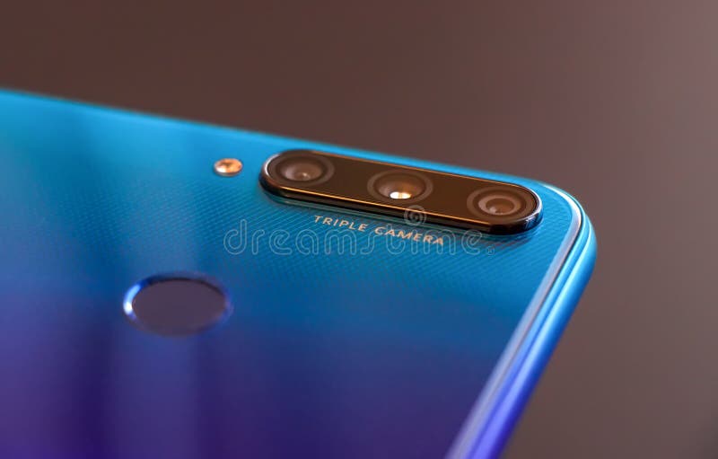New Smartphone with Three Cameras Close-up Stock Image - Image of ...