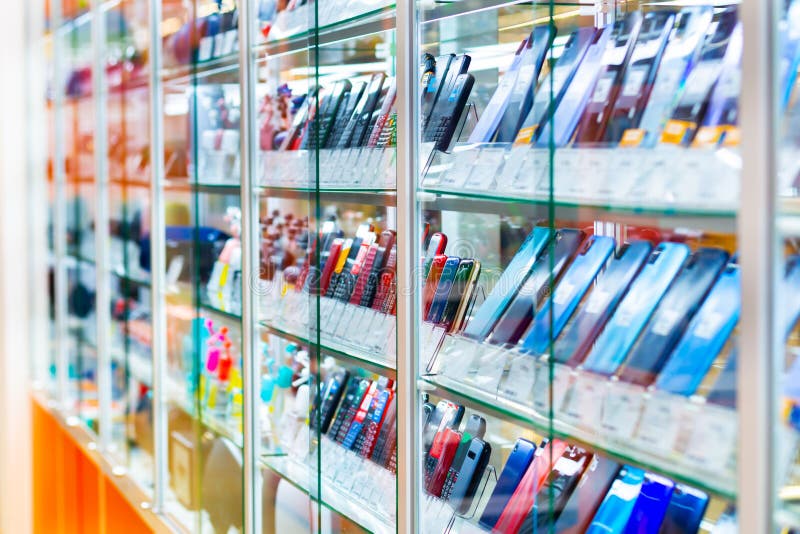 New Smartphones Stand in a Row on a Showcase in a Store Stock Photo ...
