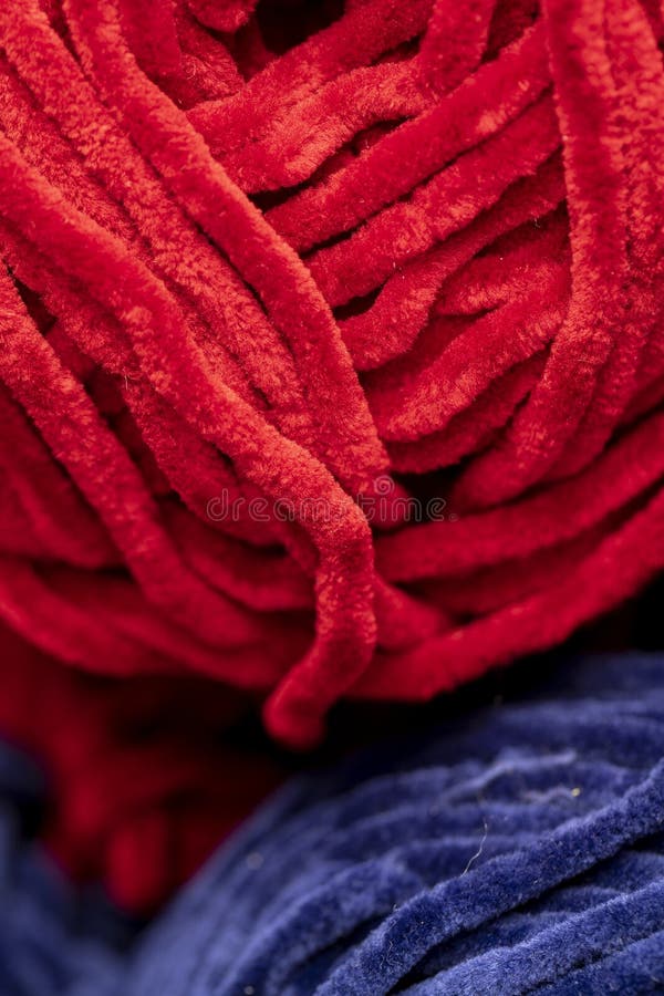 New Soft Red Threads with Traces of Other Threads in Close-up Stock ...