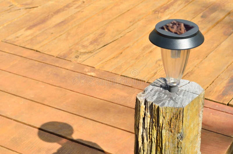 New Solar Lamp on Wood Bridge Stock Image - Image of electrical, light ...