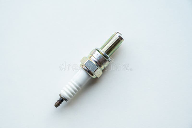 New spark plug for cars. stock photo. Image of maintenance - 372389670