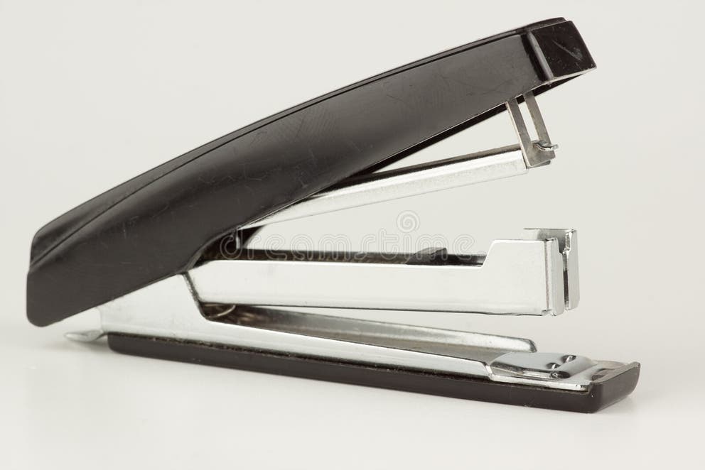 Stapler for Stapling Papers on a Table Stock Image - Image of white ...