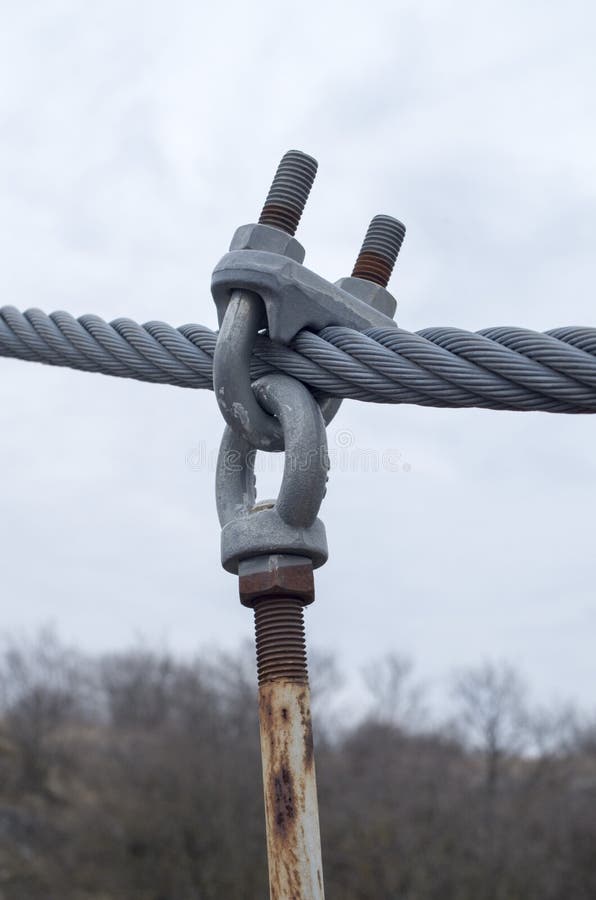 New Steel Braided Rope and Old Rusty Bracket on Bridge Stock Image ...
