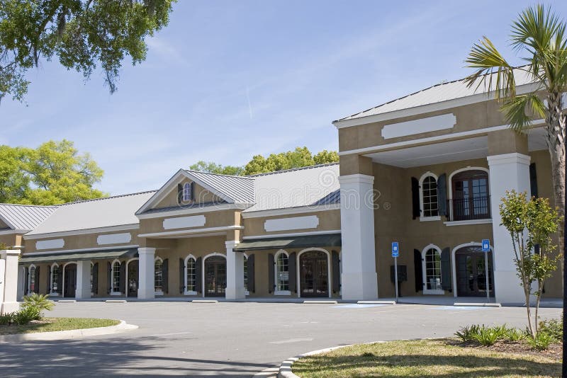 Brick upscale strip mall stock image. Image of business - 8596013