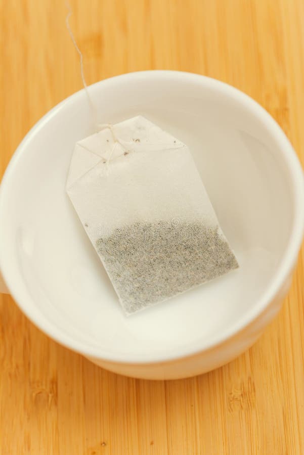 New Tea Bag is in an Empty White Mug Stock Image - Image of teabag ...