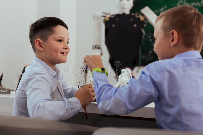 Nice Smart Boys Discussing Robots Stock Image - Image of robot ...