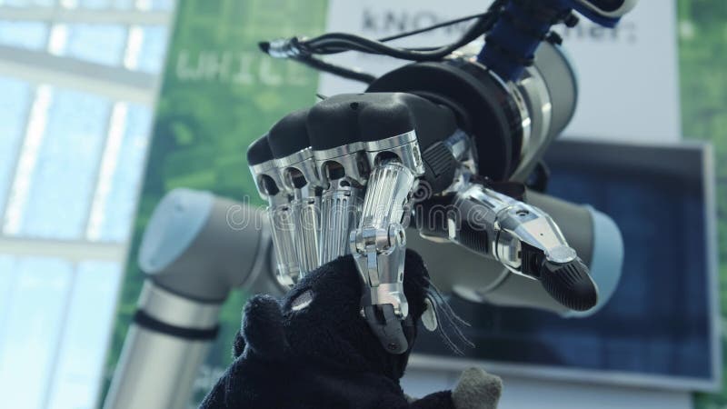 New Technologies among Us. the Hand of the Robot Takes a Soft Toy in ...