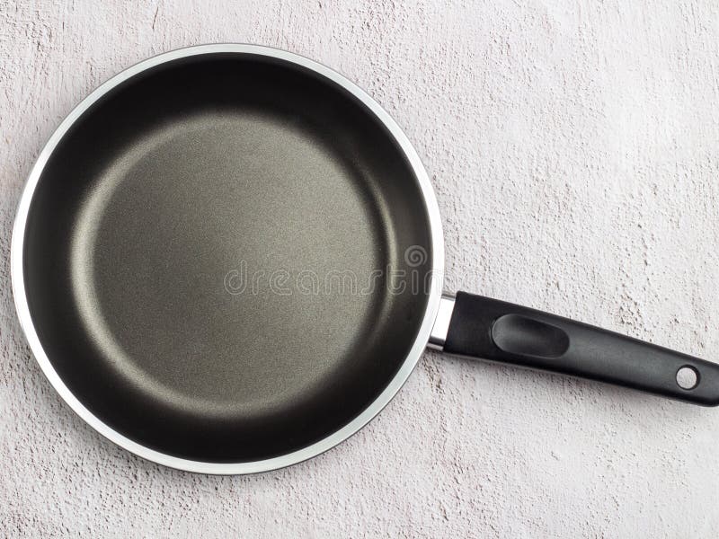 New Teflon Frying Pan As Seen from Above Stock Image - Image of board ...