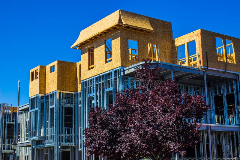 Old Three Story Brick Building Stock Photo - Image of vintage, roofs ...