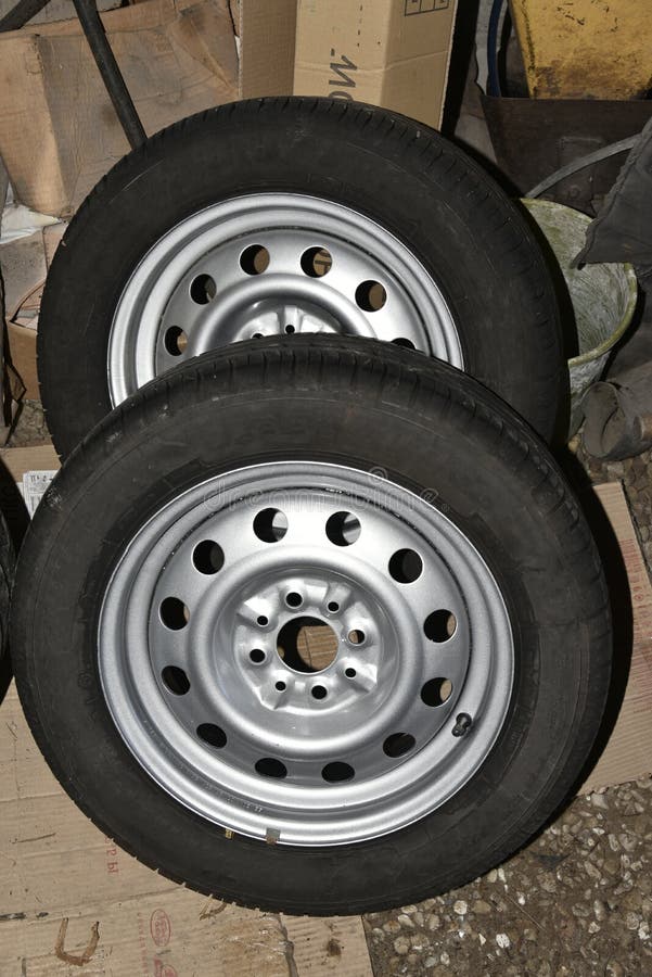 New Tire with Rubber on the Iron Disc of the Car Stock Photo - Image of ...