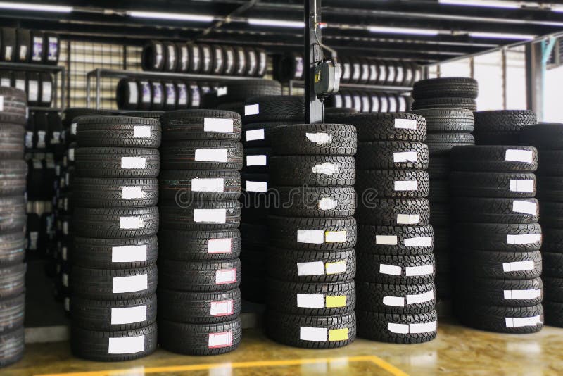 New Tires Sold in Wheel Repair Shops Stock Photo - Image of garage ...
