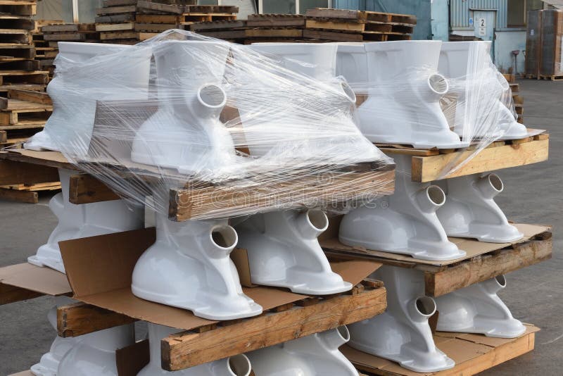 Sanitary Ware Production. New Toilets are Laid on a Pallet for ...