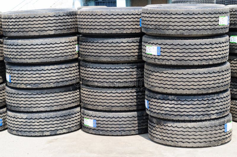 New truck tires stack up stock photo. Image of textured - 77704462