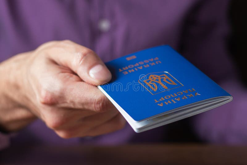 New Ukrainian Blue Biometric Passport with Identification Chip in Hands ... New Ukrainian Blue Biometric Passport with Identification Chip in Hands ...