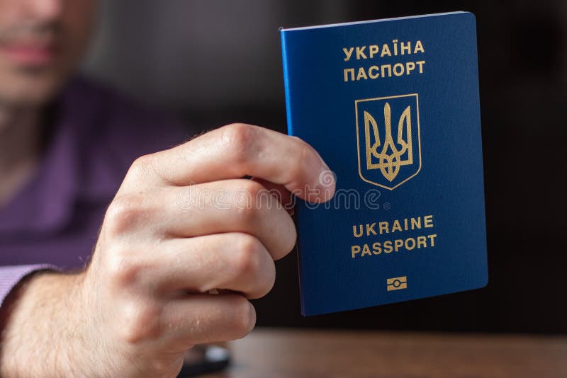 New Ukrainian Blue Biometric Passport with Identification Chip in Hands ... New Ukrainian Blue Biometric Passport with Identification Chip in Hands ...