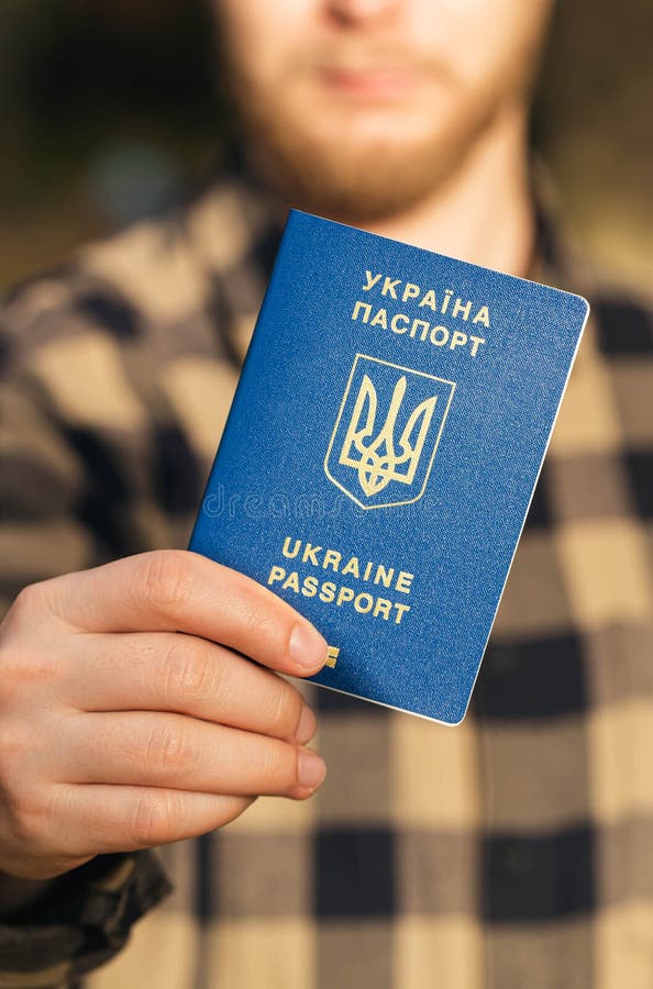 New Ukrainian Blue Biometric Passport with Identification Chip in Hands ... New Ukrainian Blue Biometric Passport with Identification Chip in Hands ...