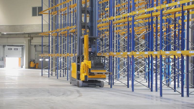 Forklift High Rack Stacker stock video. Video of warehouse - 192566017