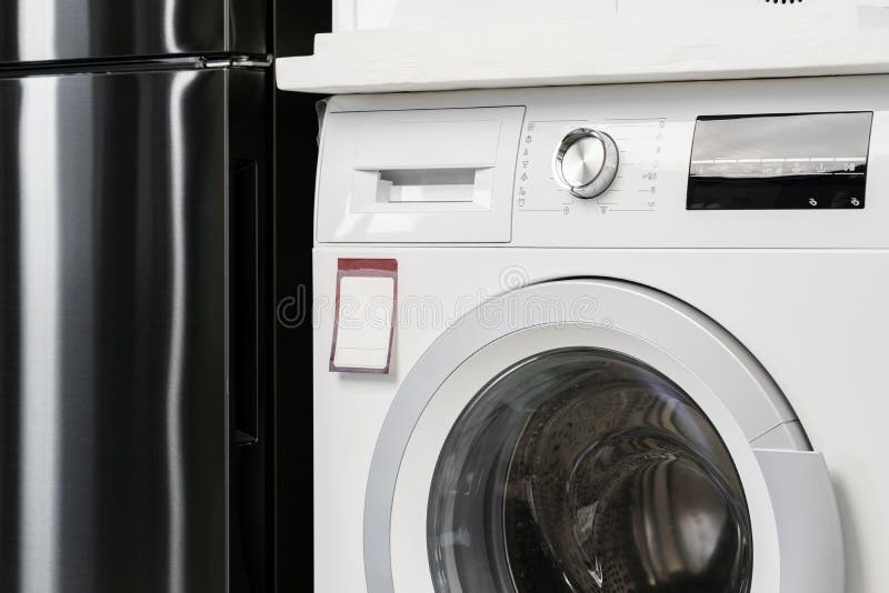 New Washing Machine in a Home Appliances Store Stock Photo - Image of ...