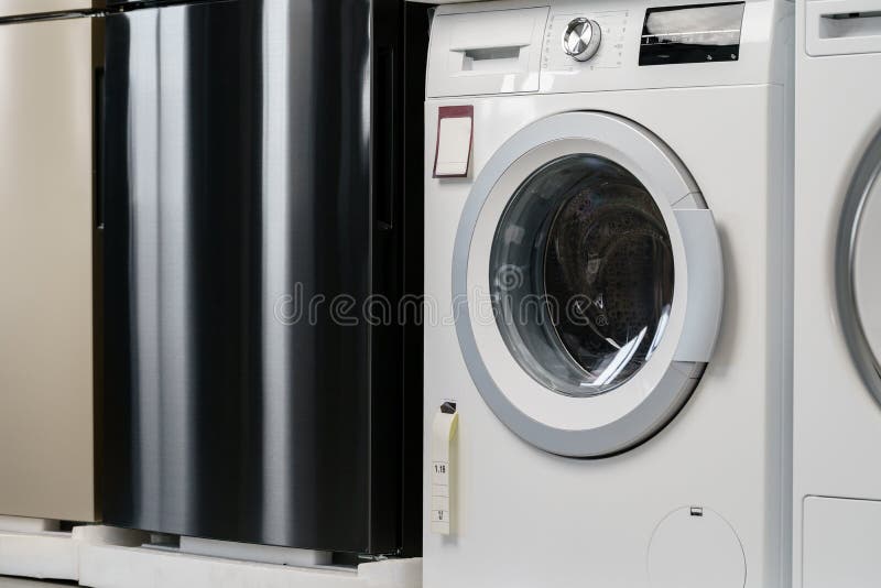New Washing Machine in a Home Appliances Store Stock Photo - Image of ...