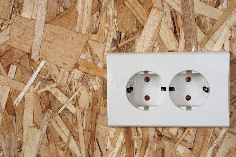 New White Double Power Socket on the Wooden Wall in New House Stock ...