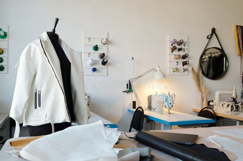 New White Leather Jacket on Mannequin and Workplace of Tailor or ...