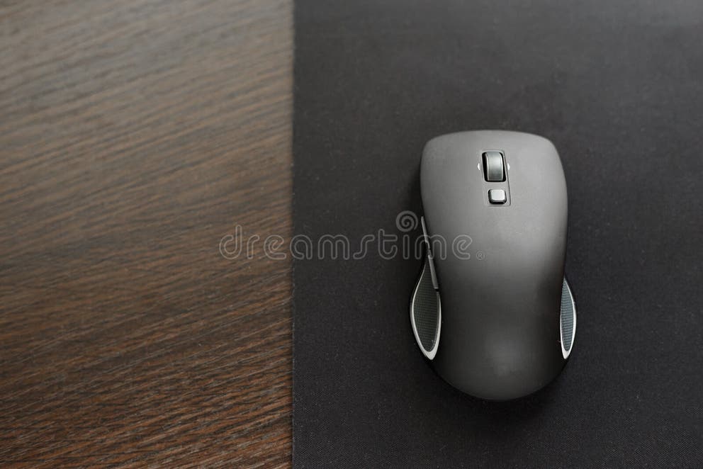 New Wireless Computer Mouse on the Desktop Stock Photo - Image of ...