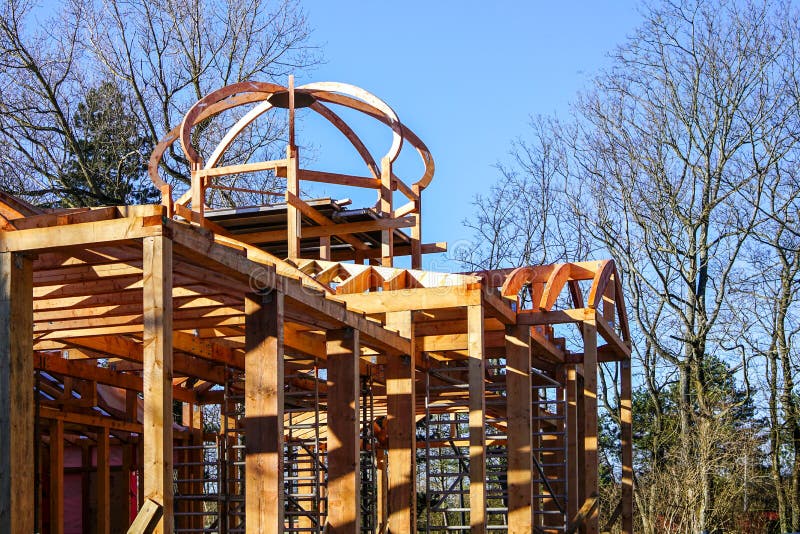 New Wooden Building Frame with a Round Domed Tower Stock Image - Image ...