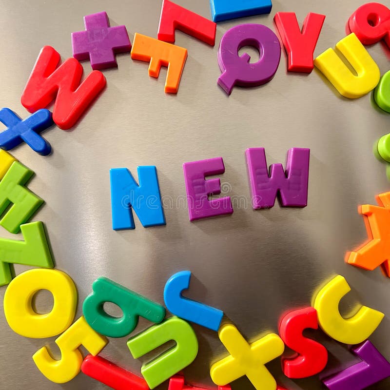 New Written in Magnetic Letters Stock Photo - Image of learning, letter ...
