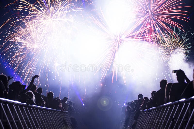 New Year Concept, Cheering Crowd and Fireworks Stock Image - Image of ...