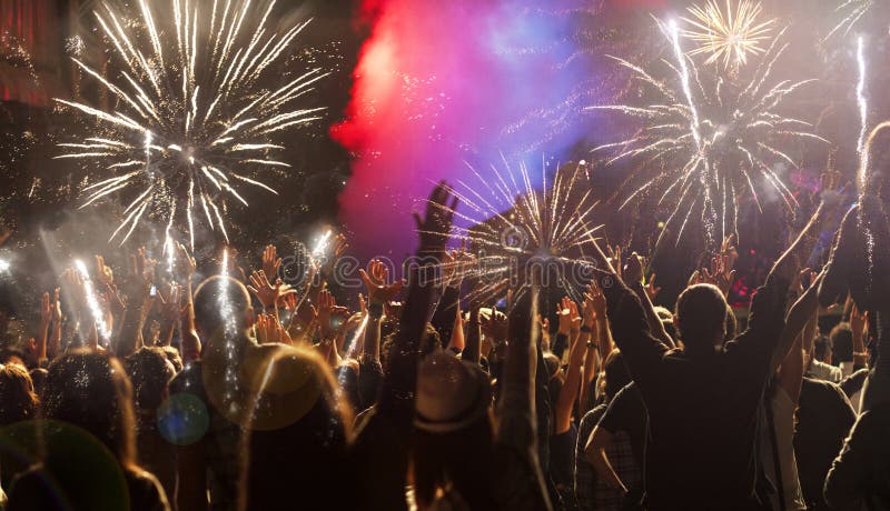 New Year Concept - Cheering Crowd and Fireworks Editorial Stock Photo ...