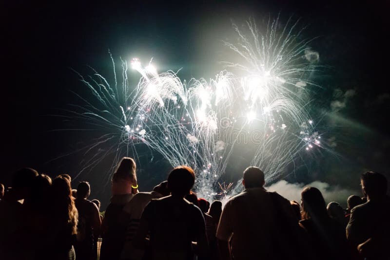 New Year Concept - Cheering Crowd and Fireworks Editorial Photo - Image ...