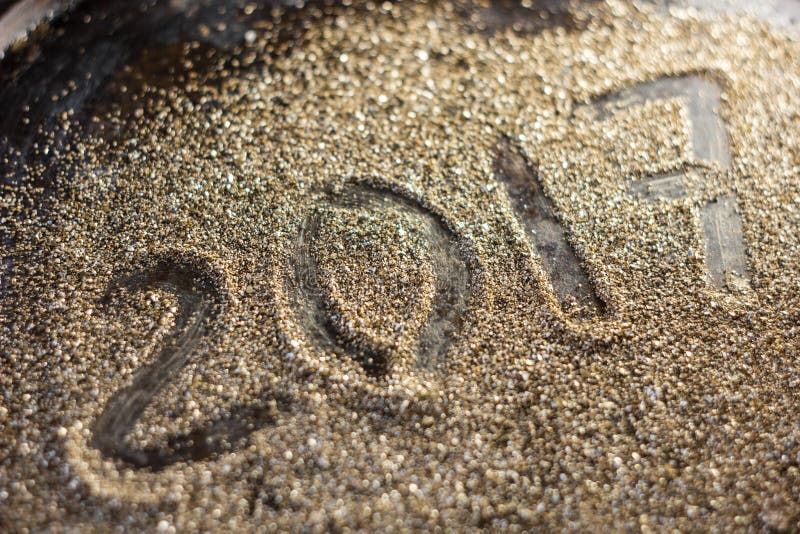 2017 New Year Concept. Numbers 2017 on the Gold Sand Texture. Stock ...