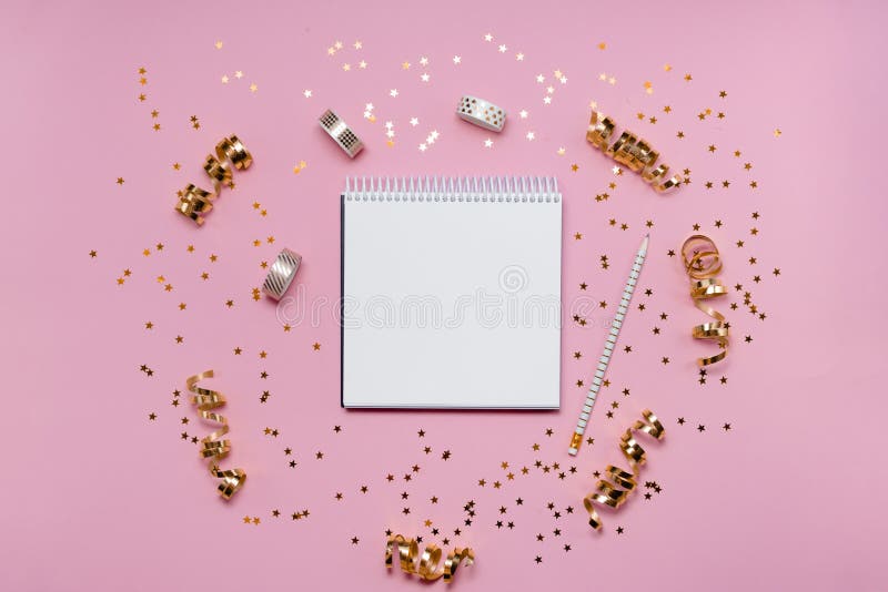 New Year Decorations and Blank White Spiral Notebook on Pink Background ...