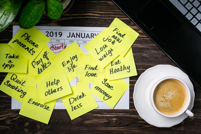 New Year Resolutions Concept - Resolutions on Post-it Notes with ...