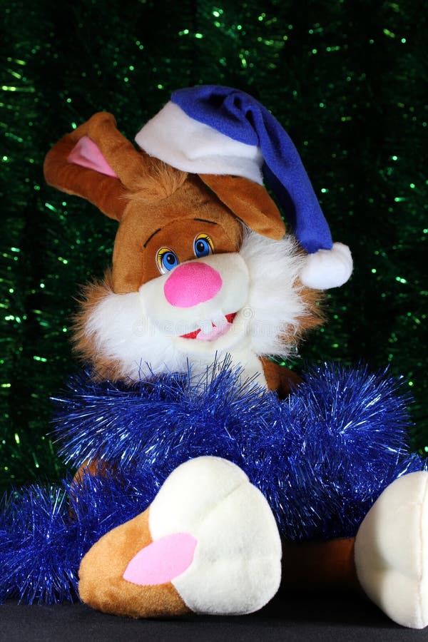 New Year S Rabbit in Tinsel Stock Image - Image of rabbit, year: 28168669