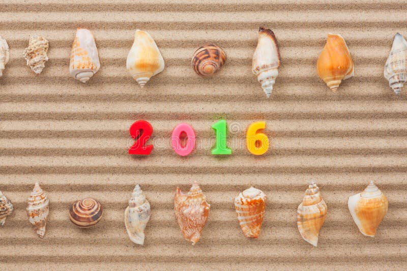 New Year 2016 Written in the Sand and Shell Stock Photo - Image of ...