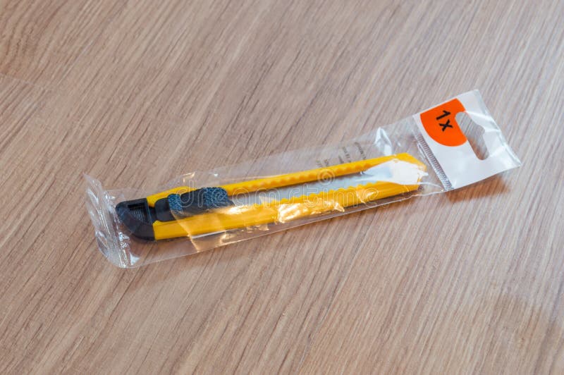 New Yellow Cutter Knife with Push Button Blade Lock Stock Image - Image ...