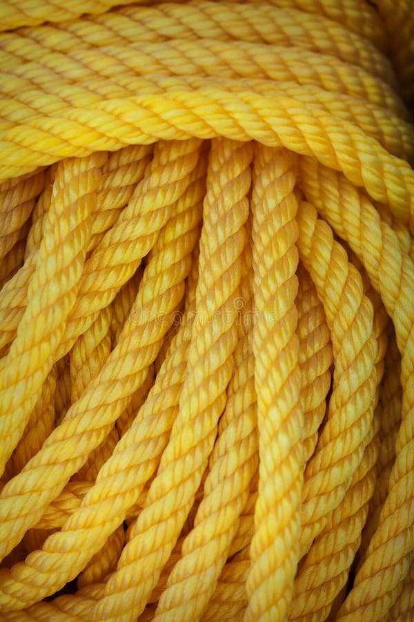 New yellow rope closeup stock photo. Image of material - 94293136